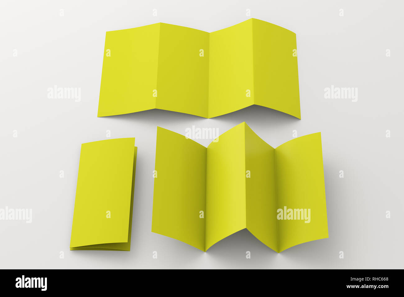 Blank yellow folded paper leaflet on white background. Eight pages ...