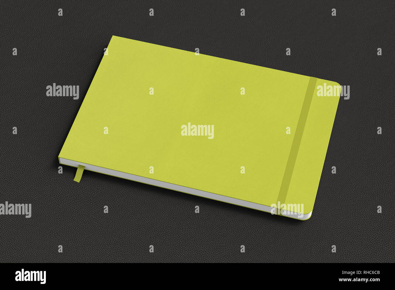 Yellow horizontal notebook with elastic band on black background Stock ...