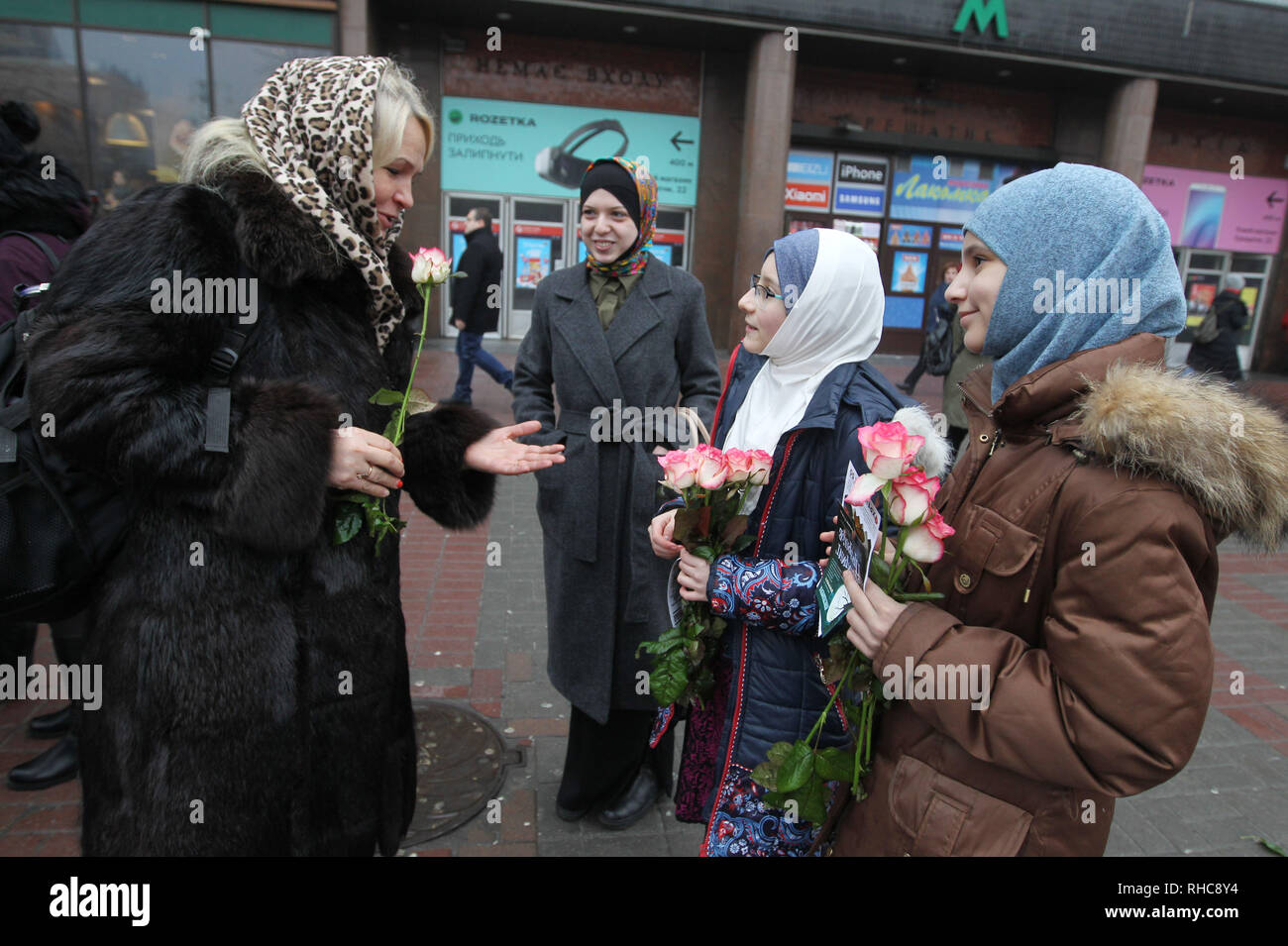 Kiev, Ukraine. 01st Feb, 2019. Ukrainian Muslim women seen with flowers ...