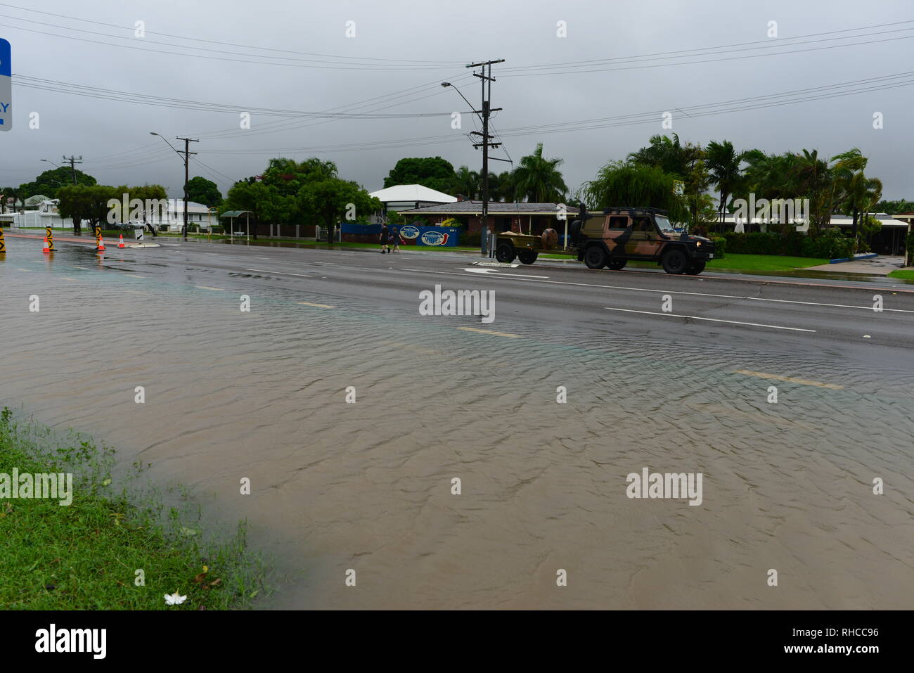 Bowen road and Ross River bridge being inundated as flood waters rise ...
