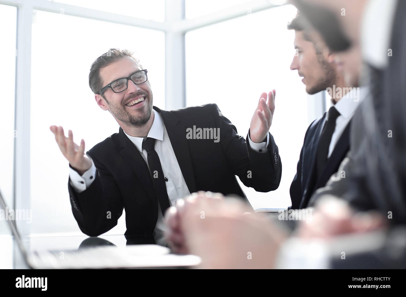 businessman explaining to his colleagues a new perspective Stock Photo ...