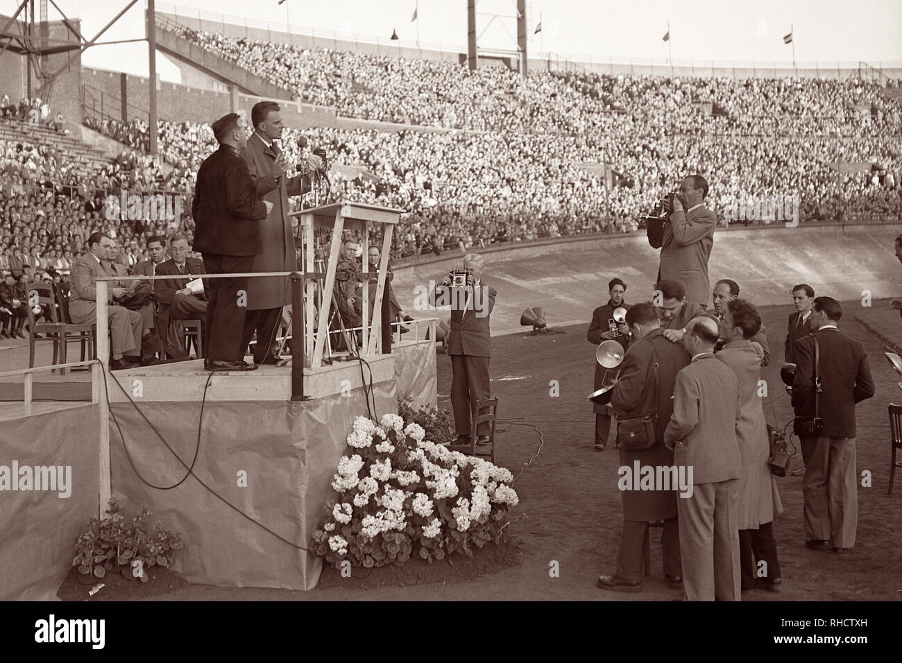 Billy Graham preaching at Olympic Stadium in Amsterdam, North Holland ...