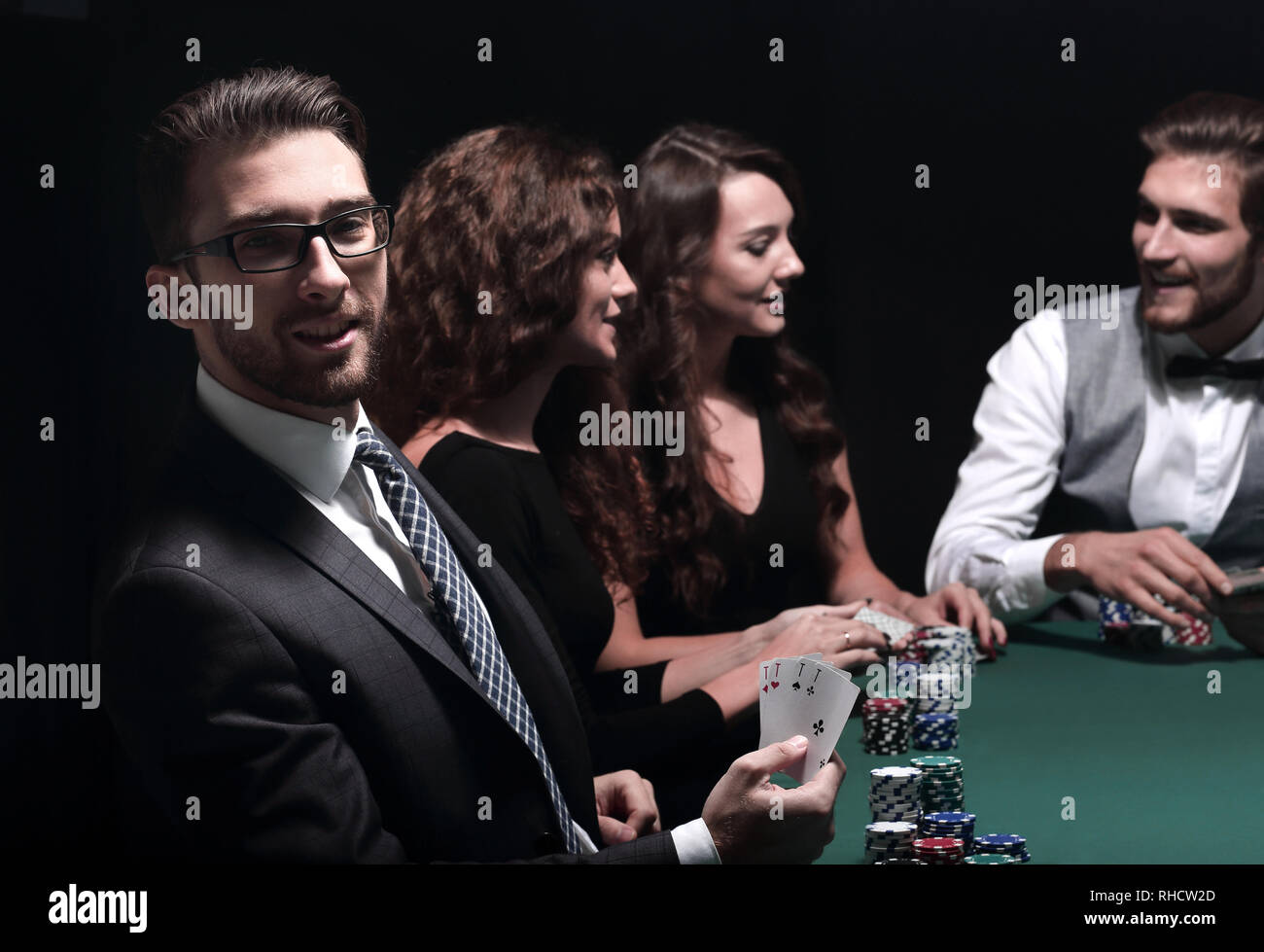 Modern businessman playing poker hi-res stock photography and images ...