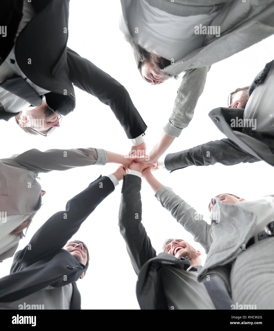 bottom view. business team showing their unity Stock Photo - Alamy