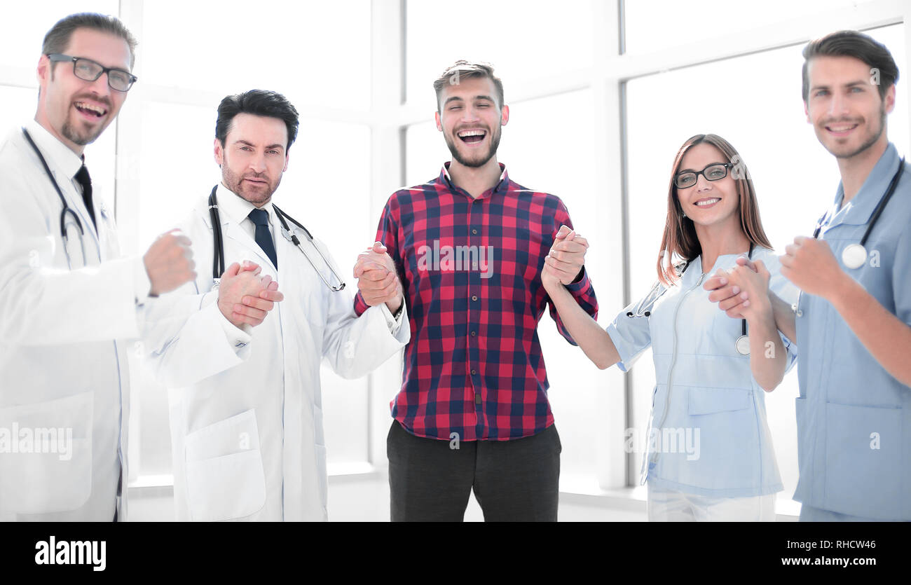 successful medical team with a patient Stock Photo - Alamy