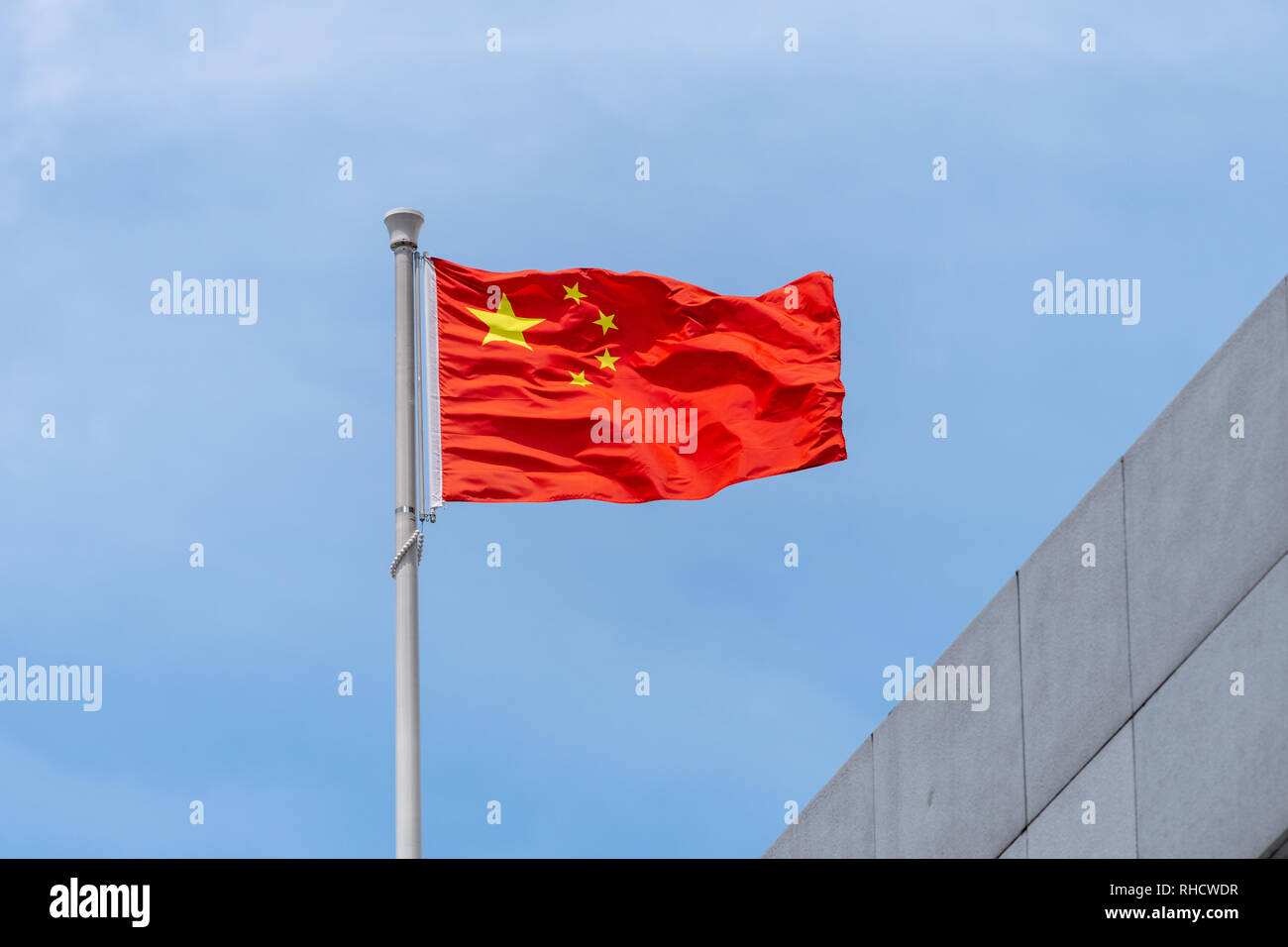 National flag of the Peoples Republic of China flying in the wind from ...