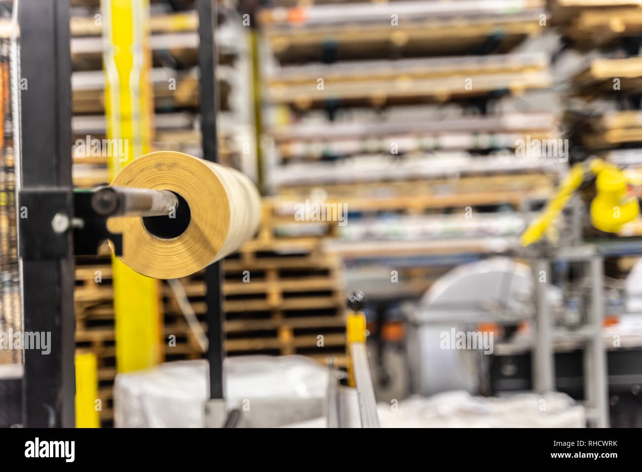 Roll of paper wrapping material in factory workshop packaging Stock ...