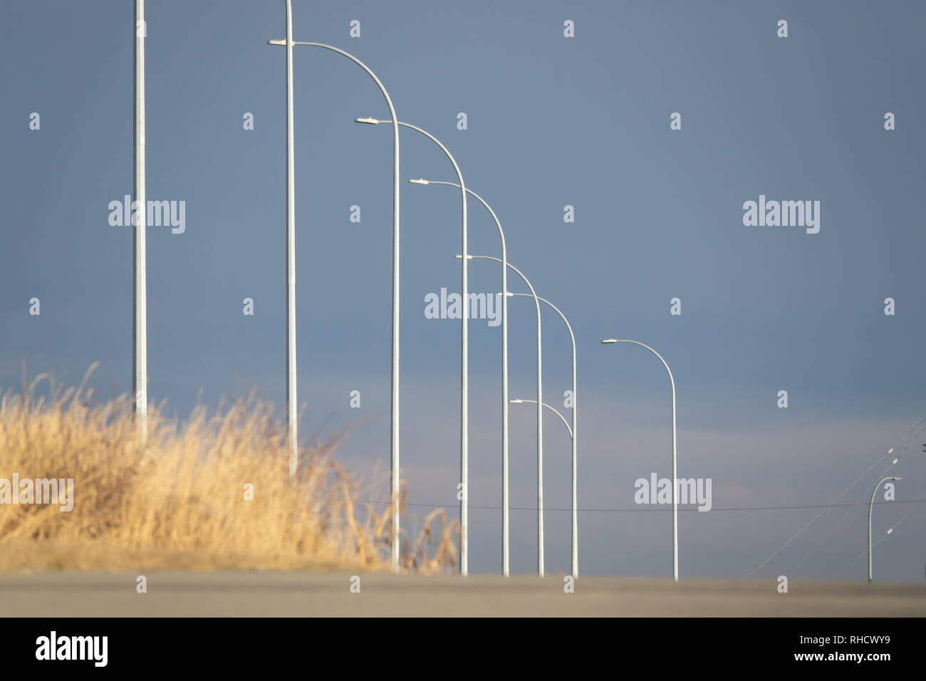 Curved light poles hi-res stock photography and images - Alamy