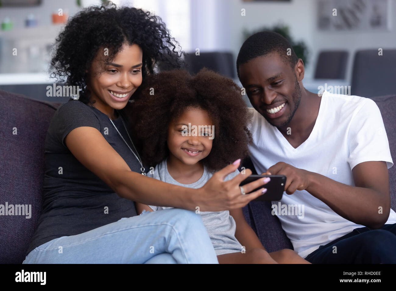 Happy african family hi-res stock photography and images - Alamy