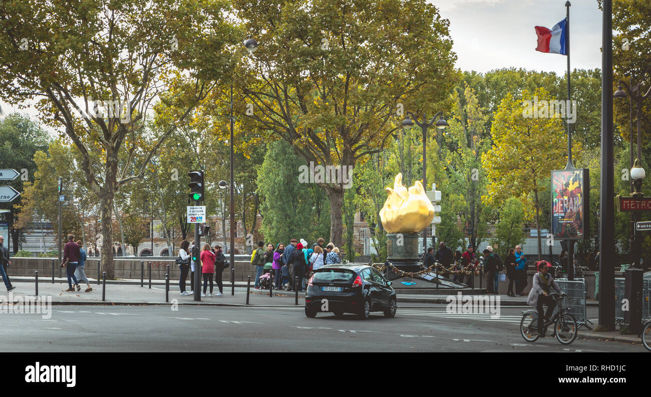 Paris, France - October 7, 2017: People watching the replica of the ...