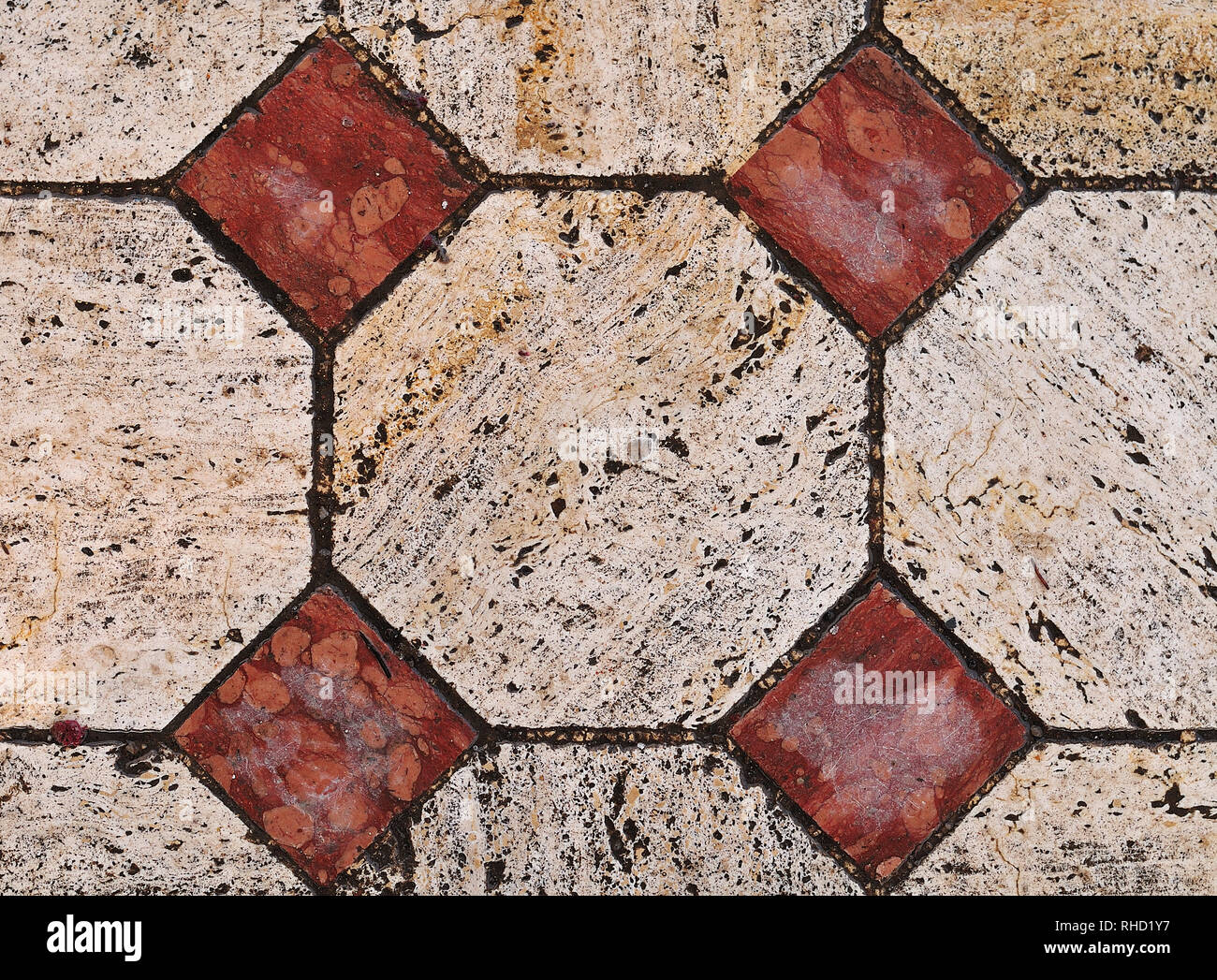 detail of historic floor laid with limestone and red marble tiles Stock ...