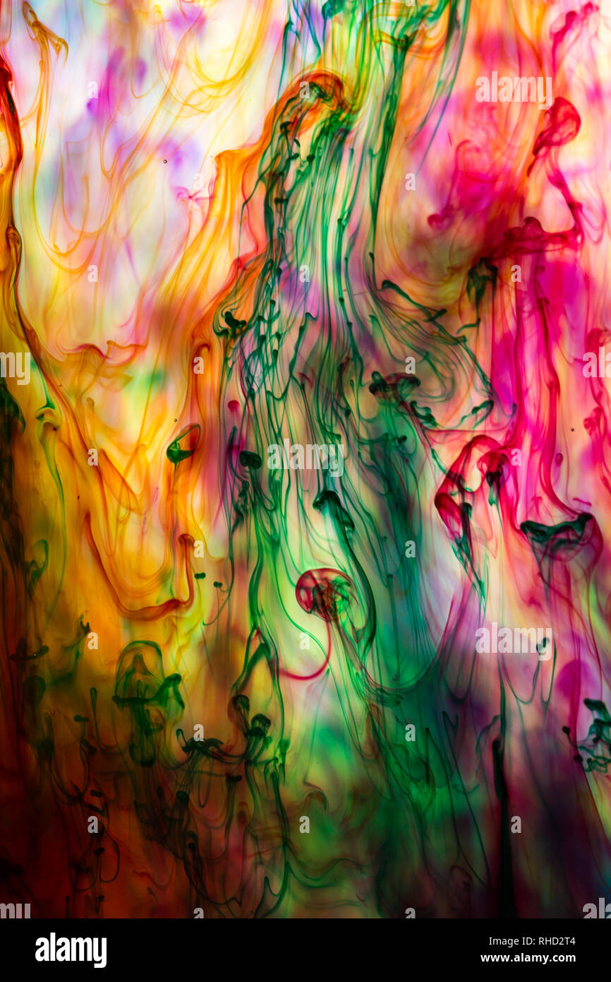 Acrylic colors and ink in water. Abstract background Stock Photo - Alamy