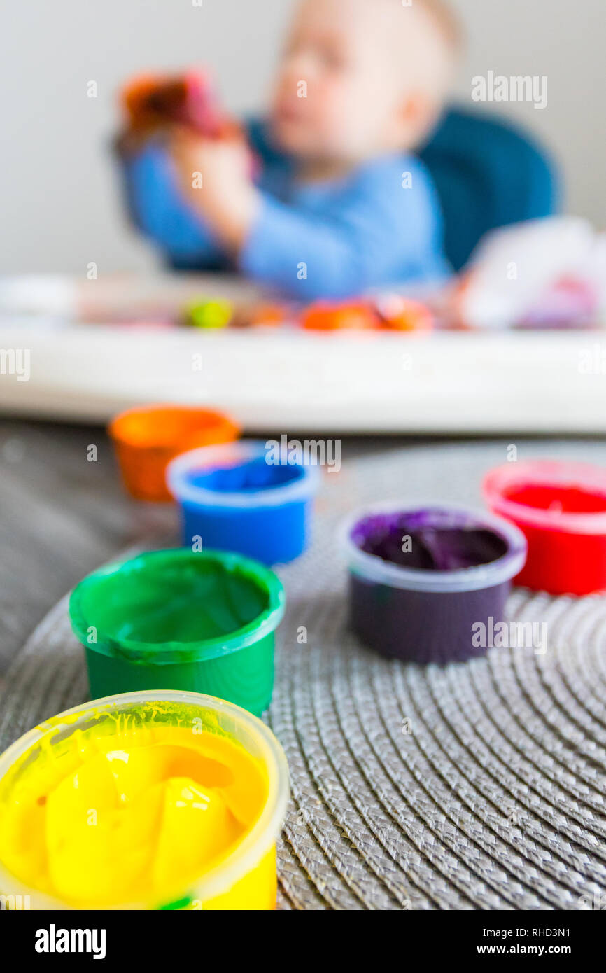 The kid paints Stock Photo - Alamy