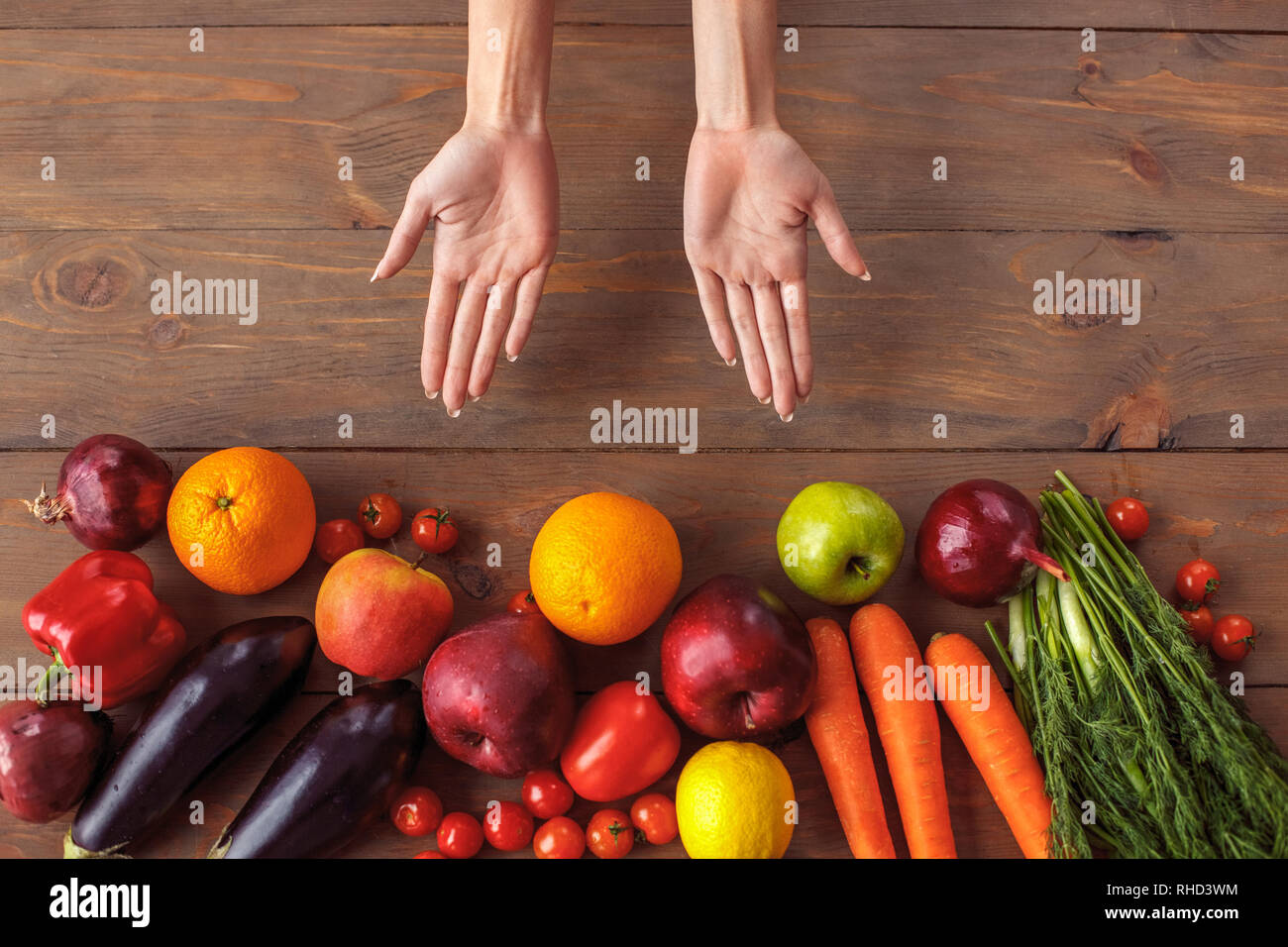 Young woman at kitchen healthy lifestyle table close-up top view ...