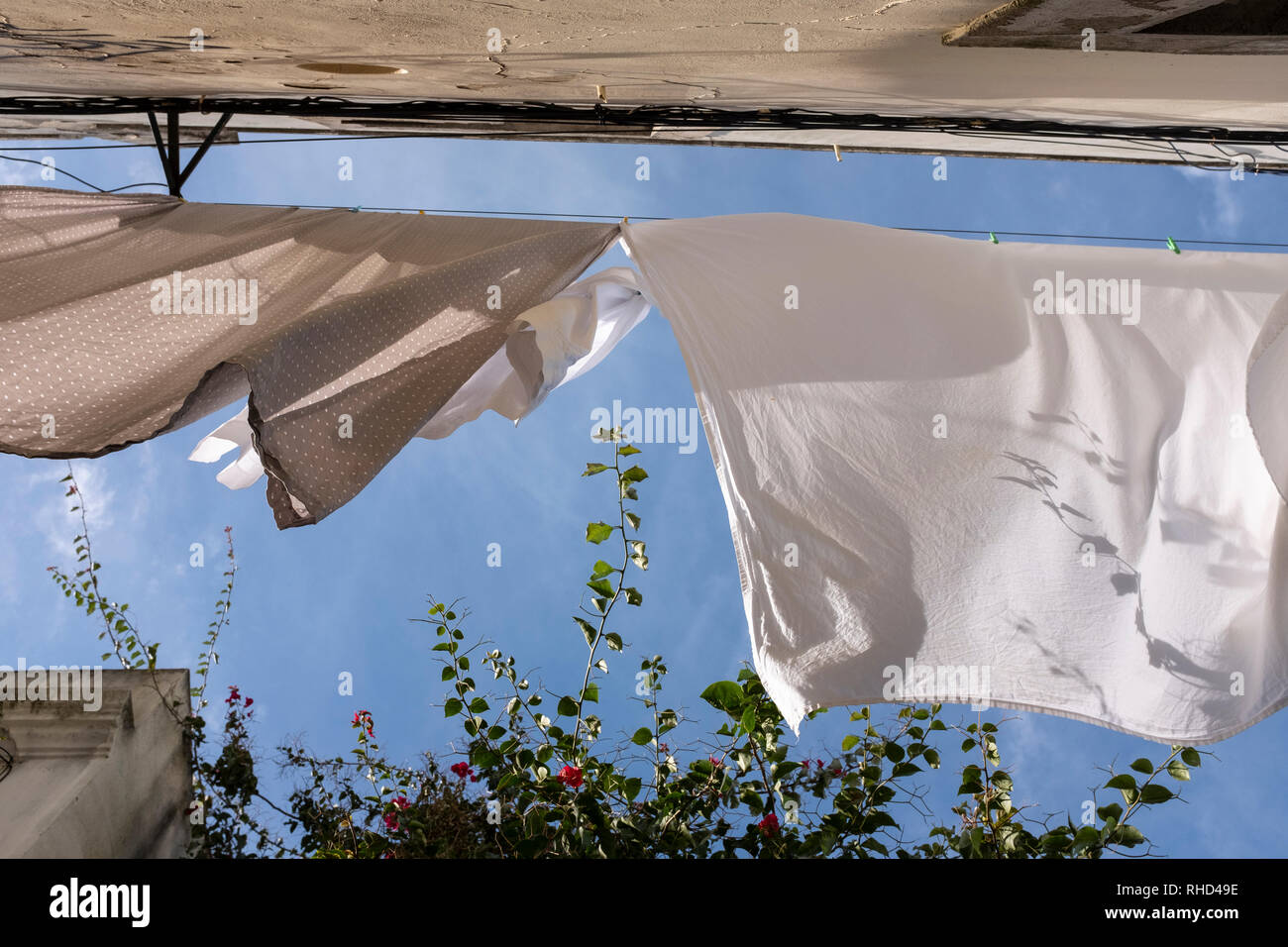 White sheets clothesline hi-res stock photography and images - Alamy