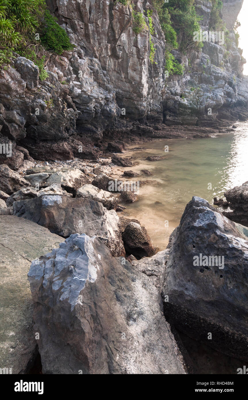 Rock limestone coastline and cliff, typical of Ha Long bay, Vietnam ...