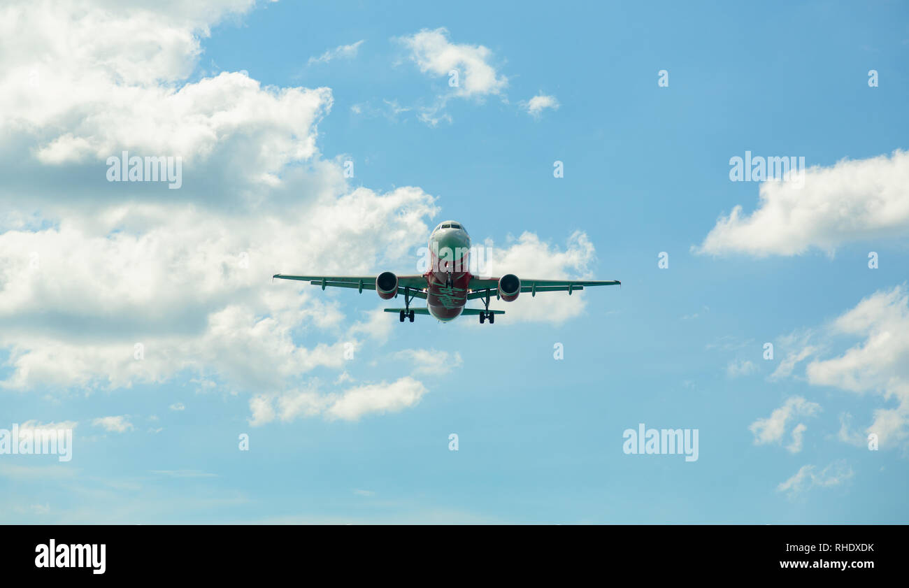Airplane airasia flies overhead hi-res stock photography and images - Alamy
