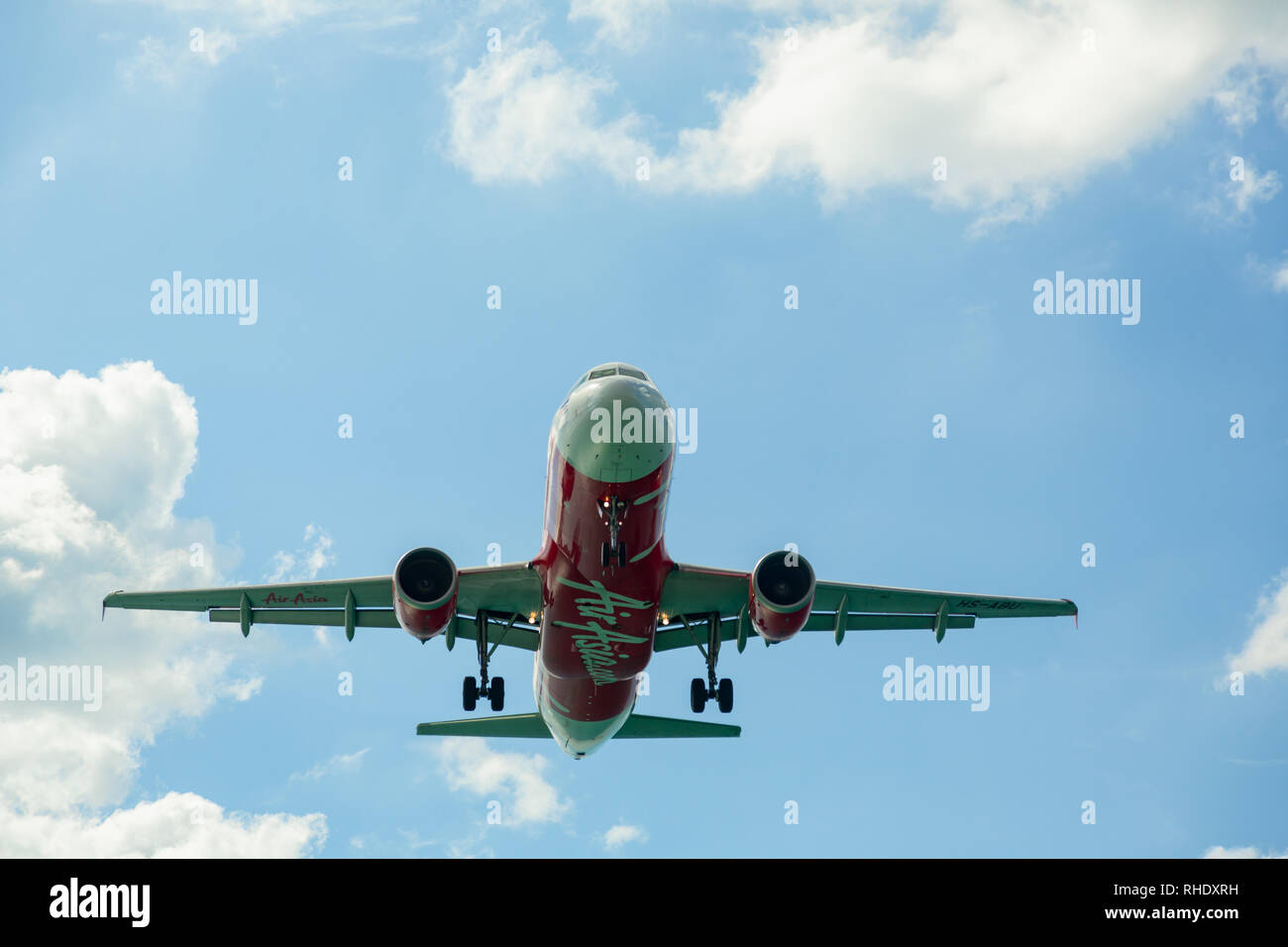 Airbus AirAsia flying overhead Stock Photo - Alamy