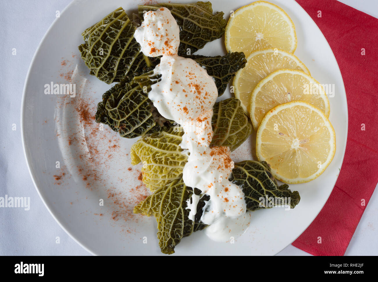 A plated dish of Turkish Sarma/Dolma, Savoy cabbage leaves stuffed with ...
