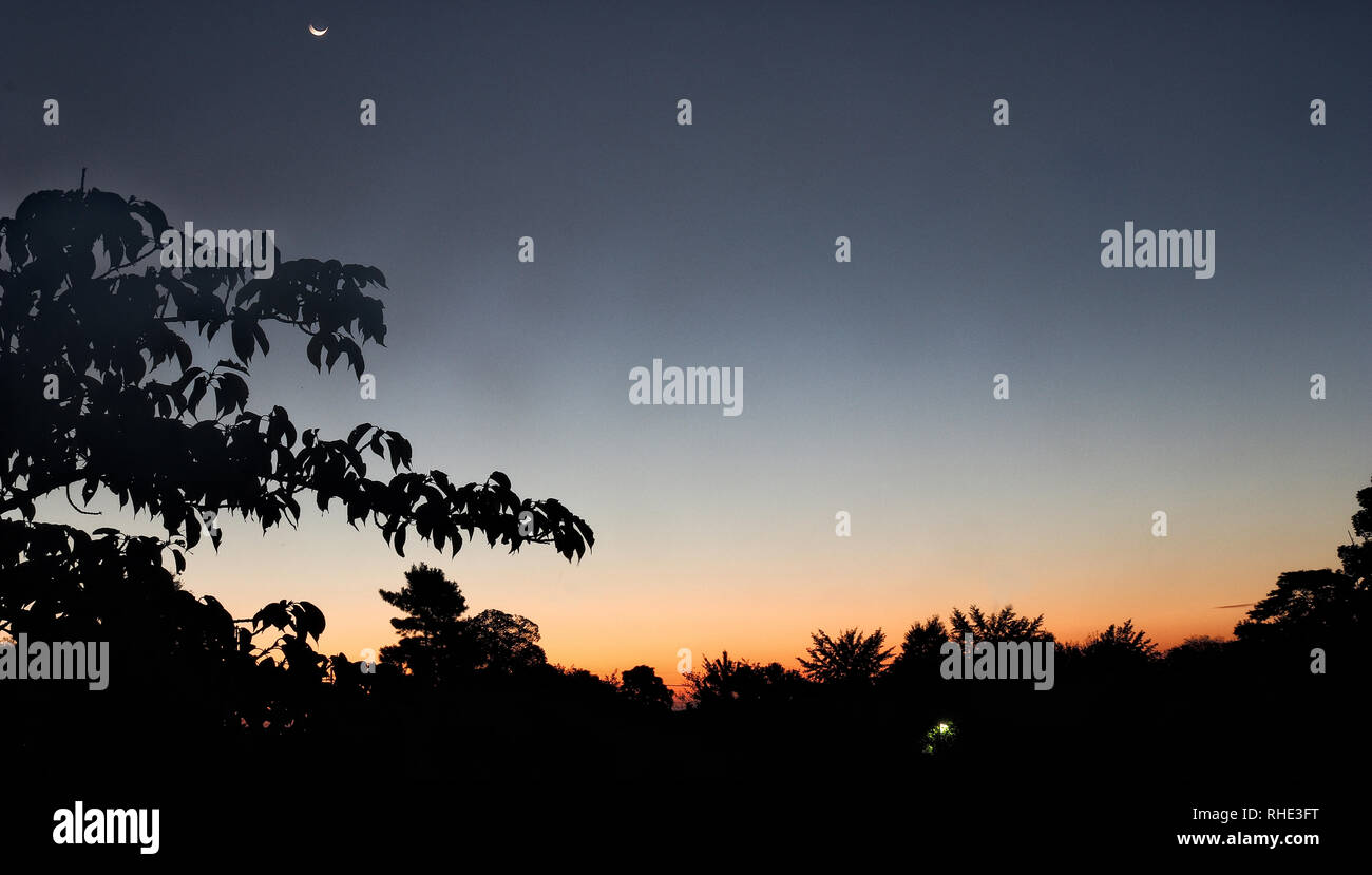 Dawn and the moon Stock Photo - Alamy