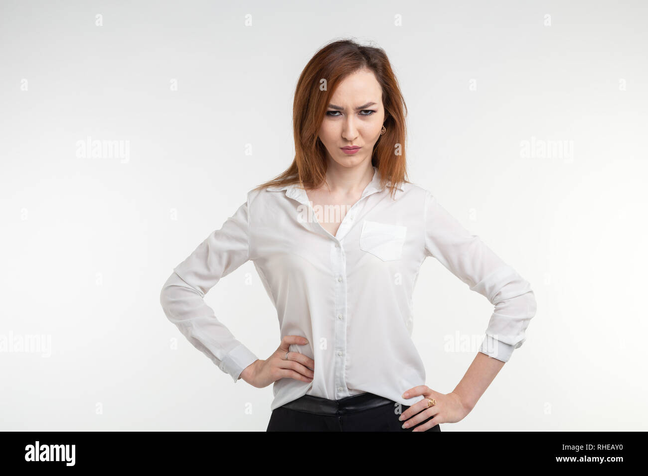 Portrait of a frustrated angry woman on white background Stock Photo ...