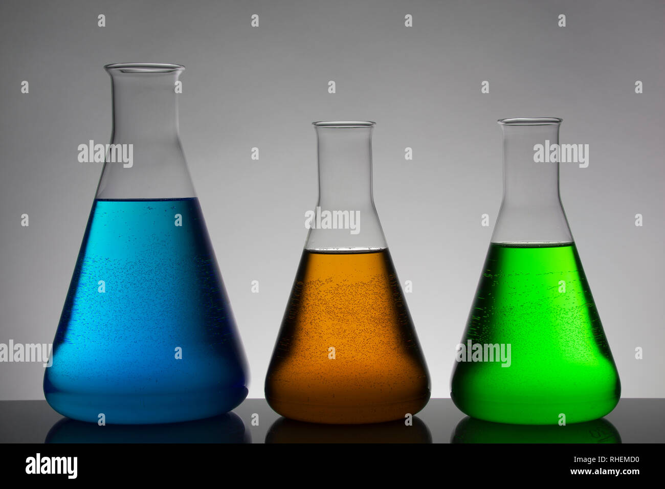 Liquid in laboratory bottles. Scientific biochemical laboratory ...