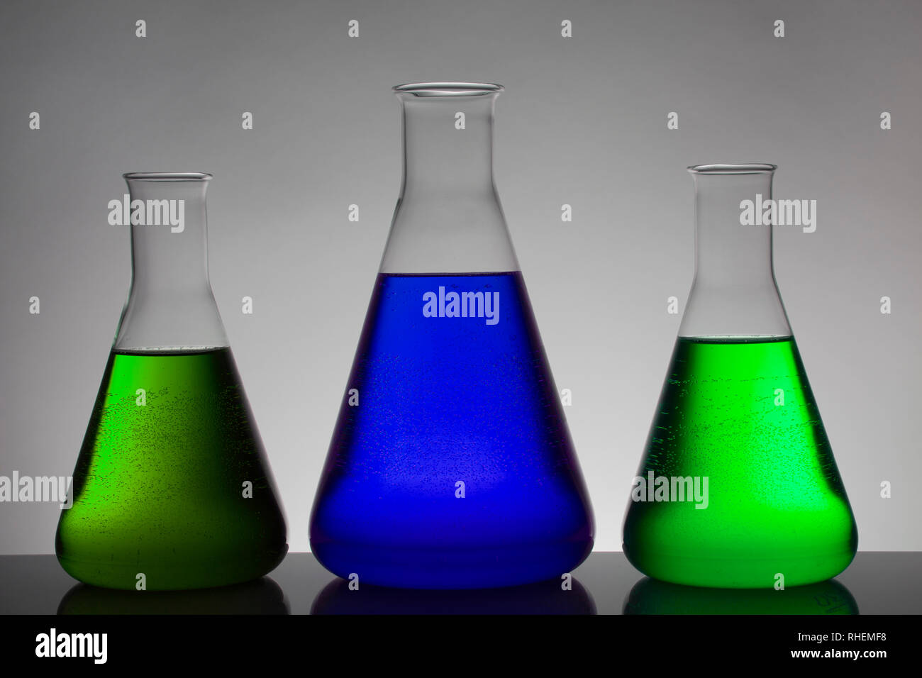 Liquid in laboratory bottles. Scientific biochemical laboratory ...