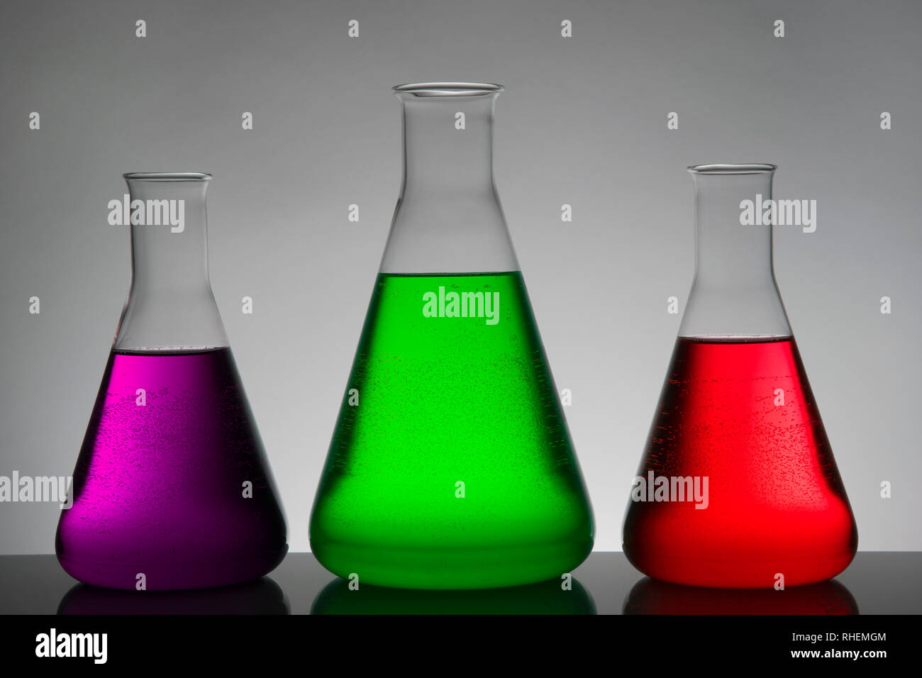 Liquid in laboratory bottles. Scientific biochemical laboratory ...