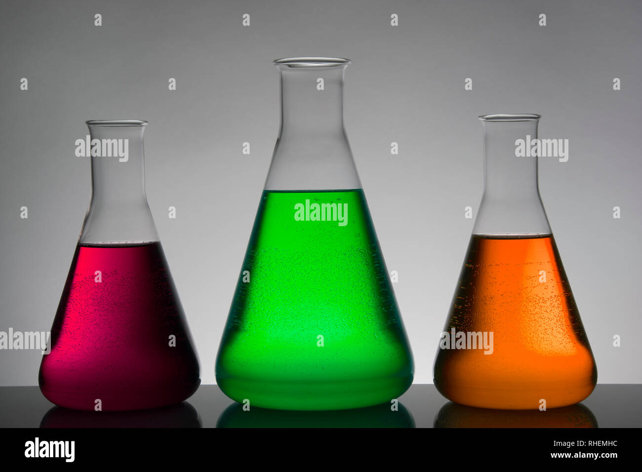 Liquid in laboratory bottles. Scientific biochemical laboratory ...