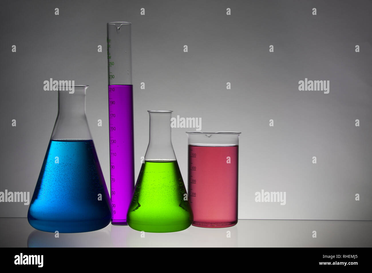 Liquid in laboratory bottles. Scientific biochemical laboratory ...