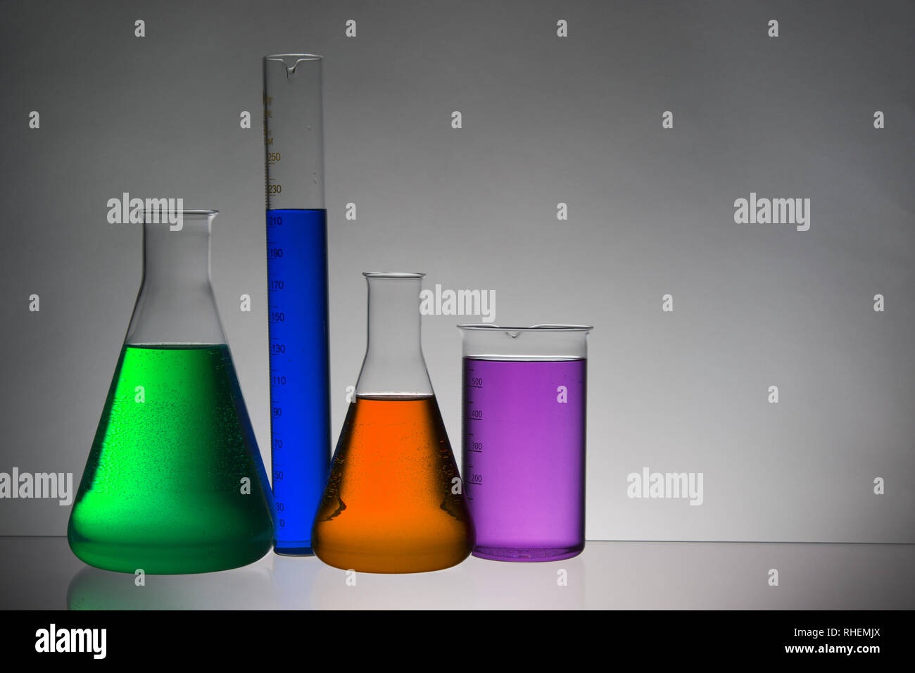 Liquid in laboratory bottles. Scientific biochemical laboratory ...