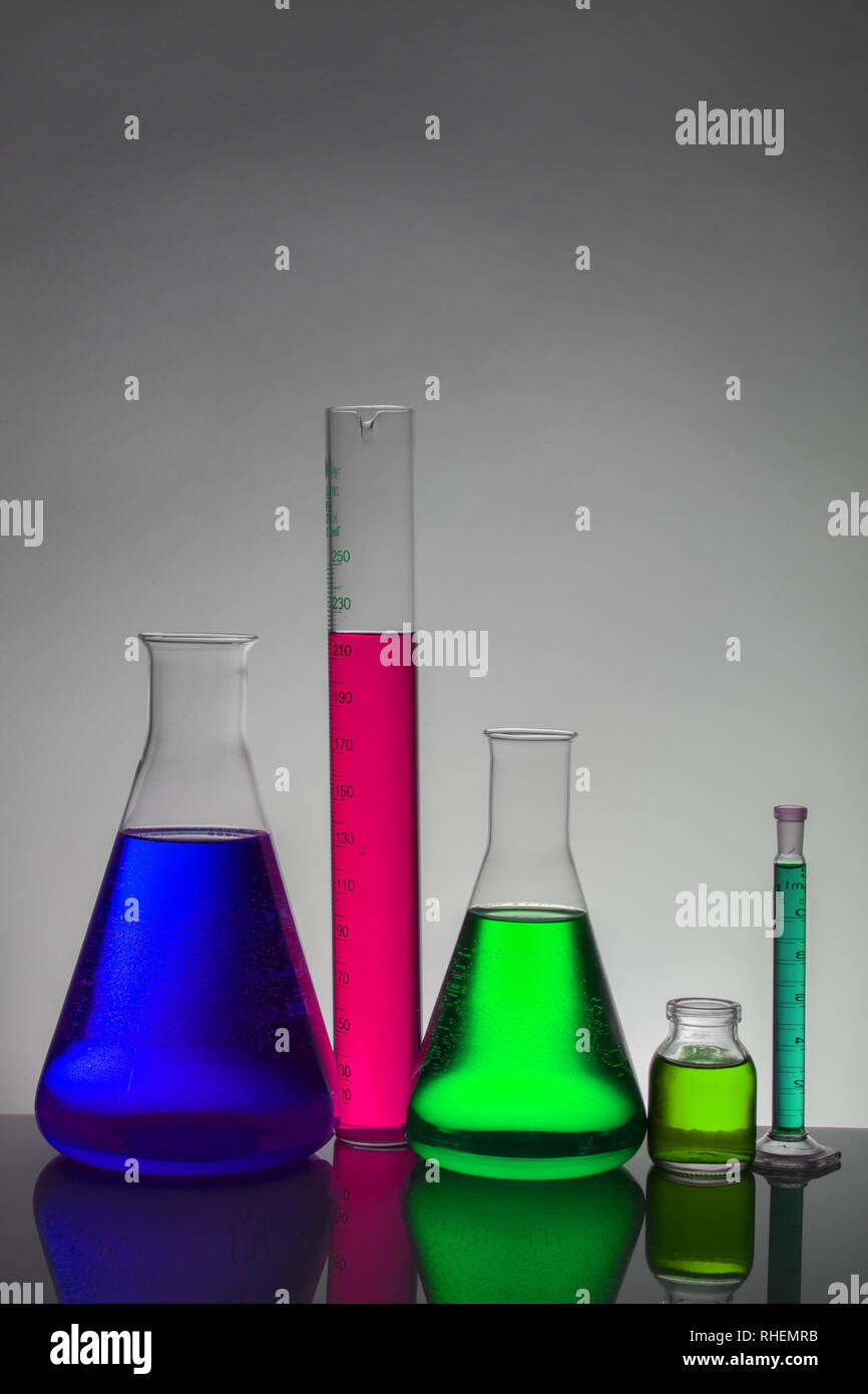 Liquid in laboratory bottles. Scientific biochemical laboratory ...