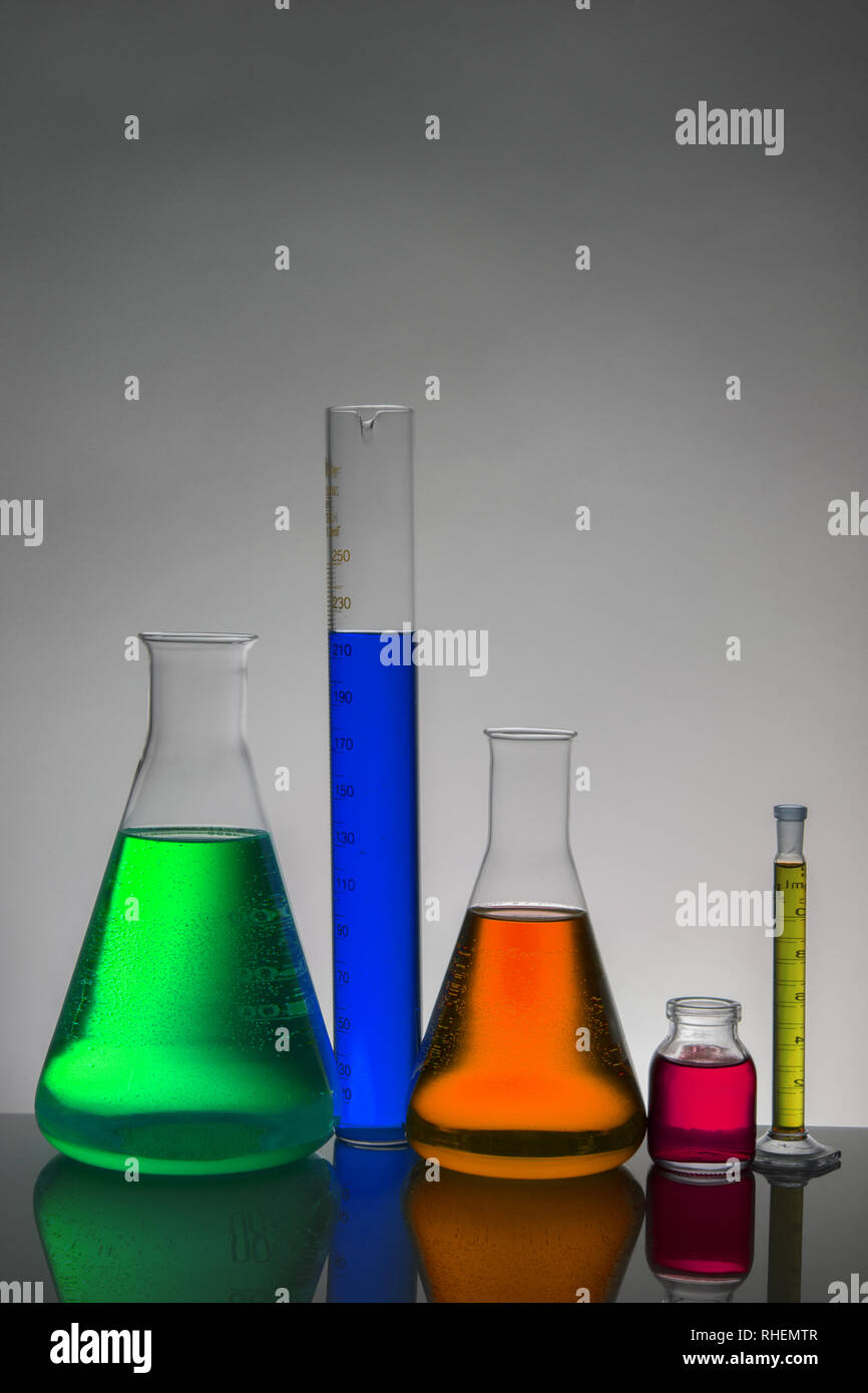 Liquid in laboratory bottles. Scientific biochemical laboratory ...