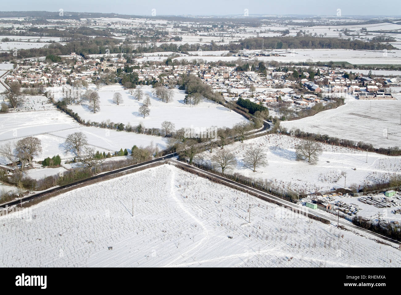 The village of Rowde and surrounding fields in Wiltshire remain covered ...