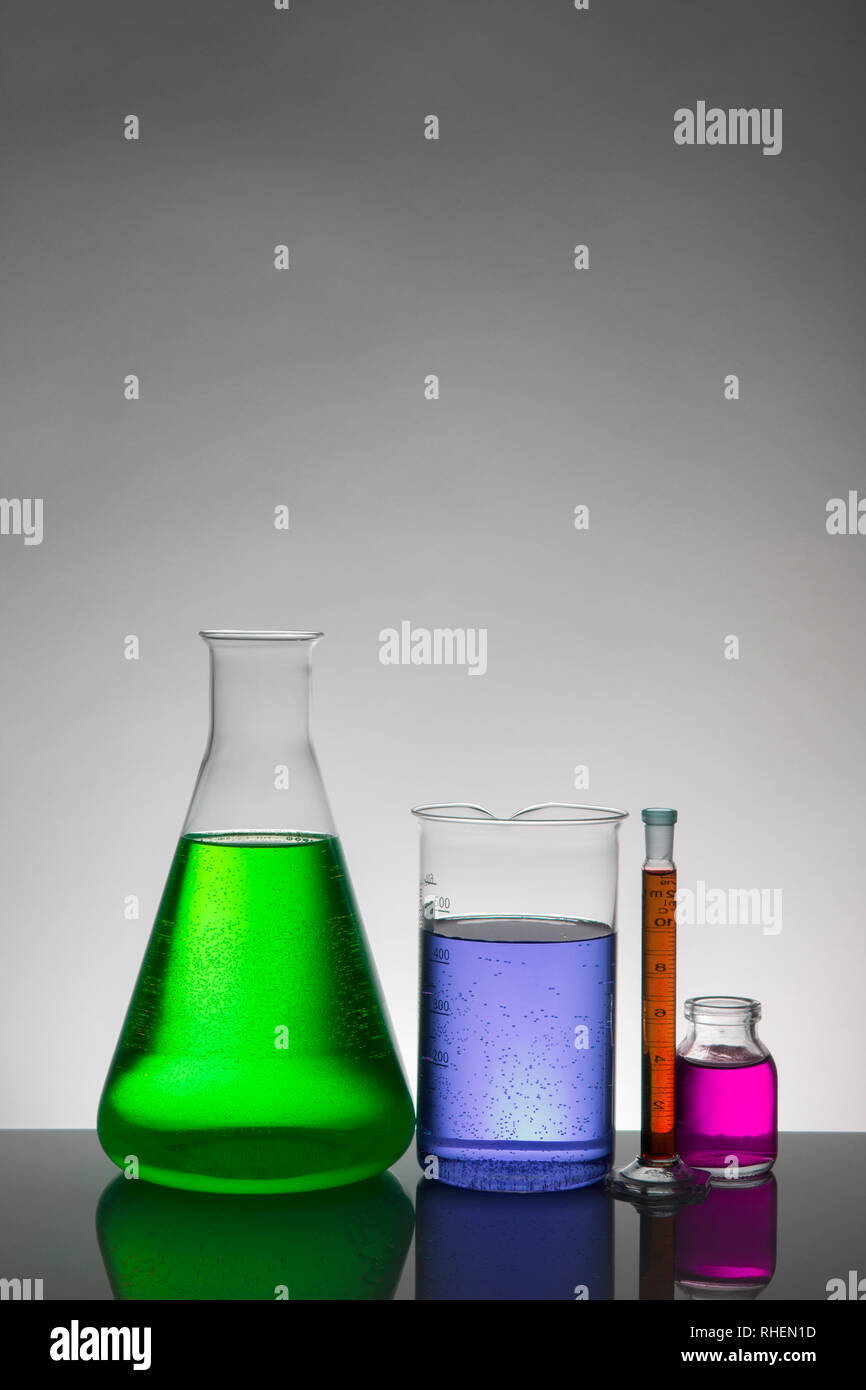 Liquid in laboratory bottles. Scientific biochemical laboratory ...