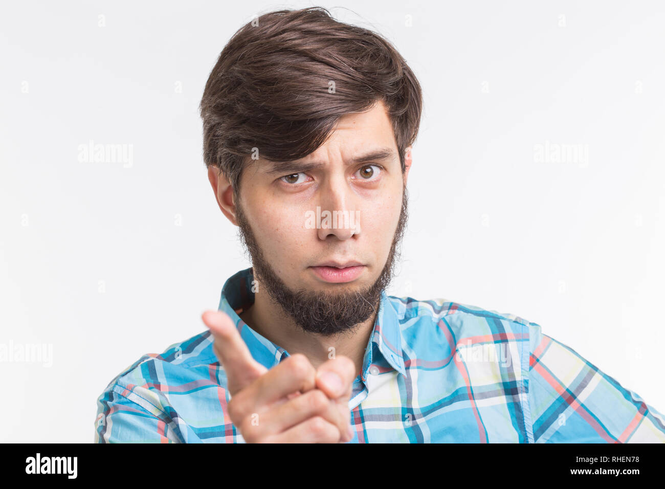 People, gesture and emotions concept - young man waving his finger on ...