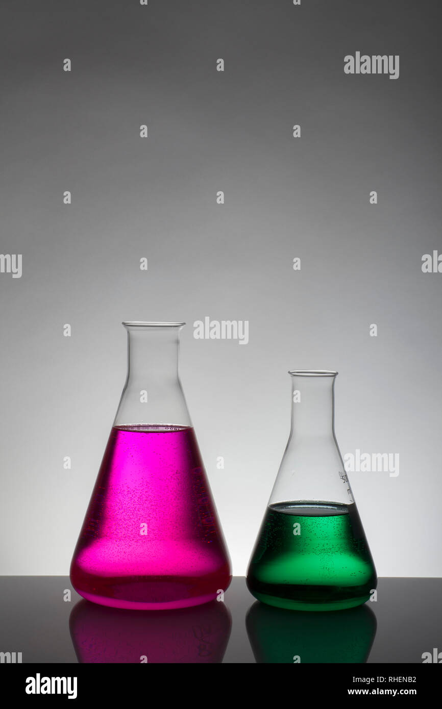 Liquid in laboratory bottles. Scientific biochemical laboratory ...