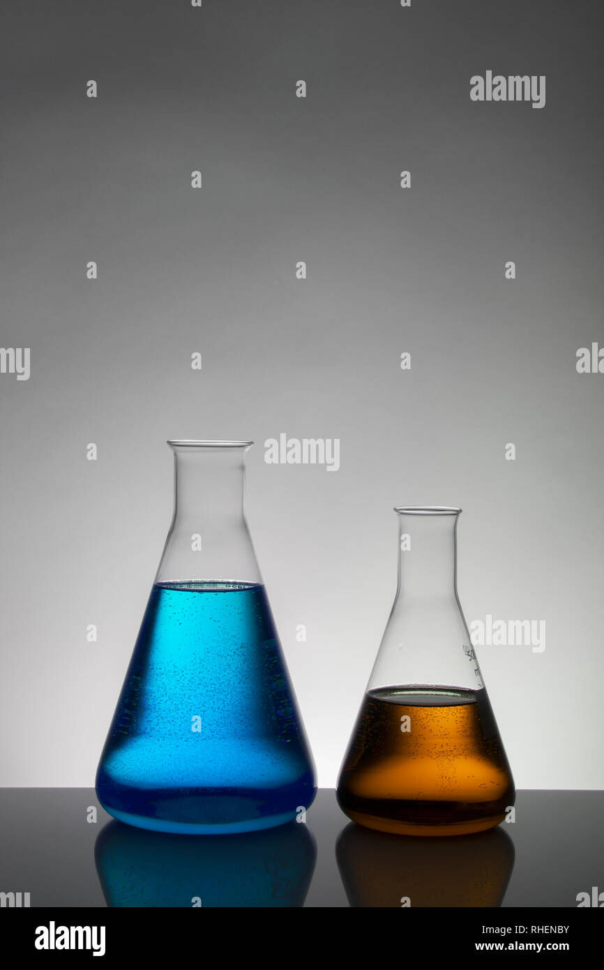 Liquid in laboratory bottles. Scientific biochemical laboratory ...