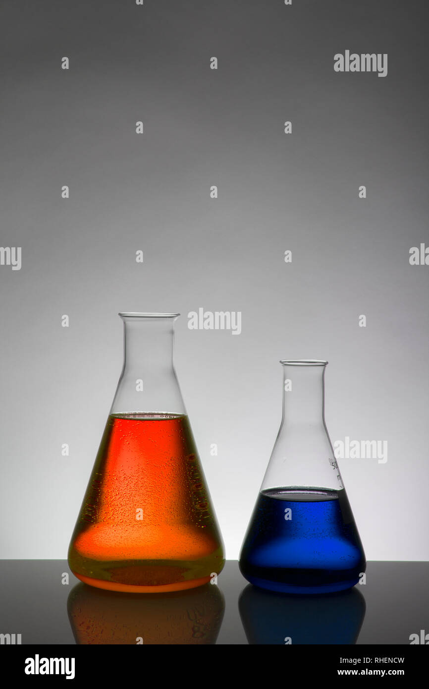 Liquid in laboratory bottles. Scientific biochemical laboratory ...