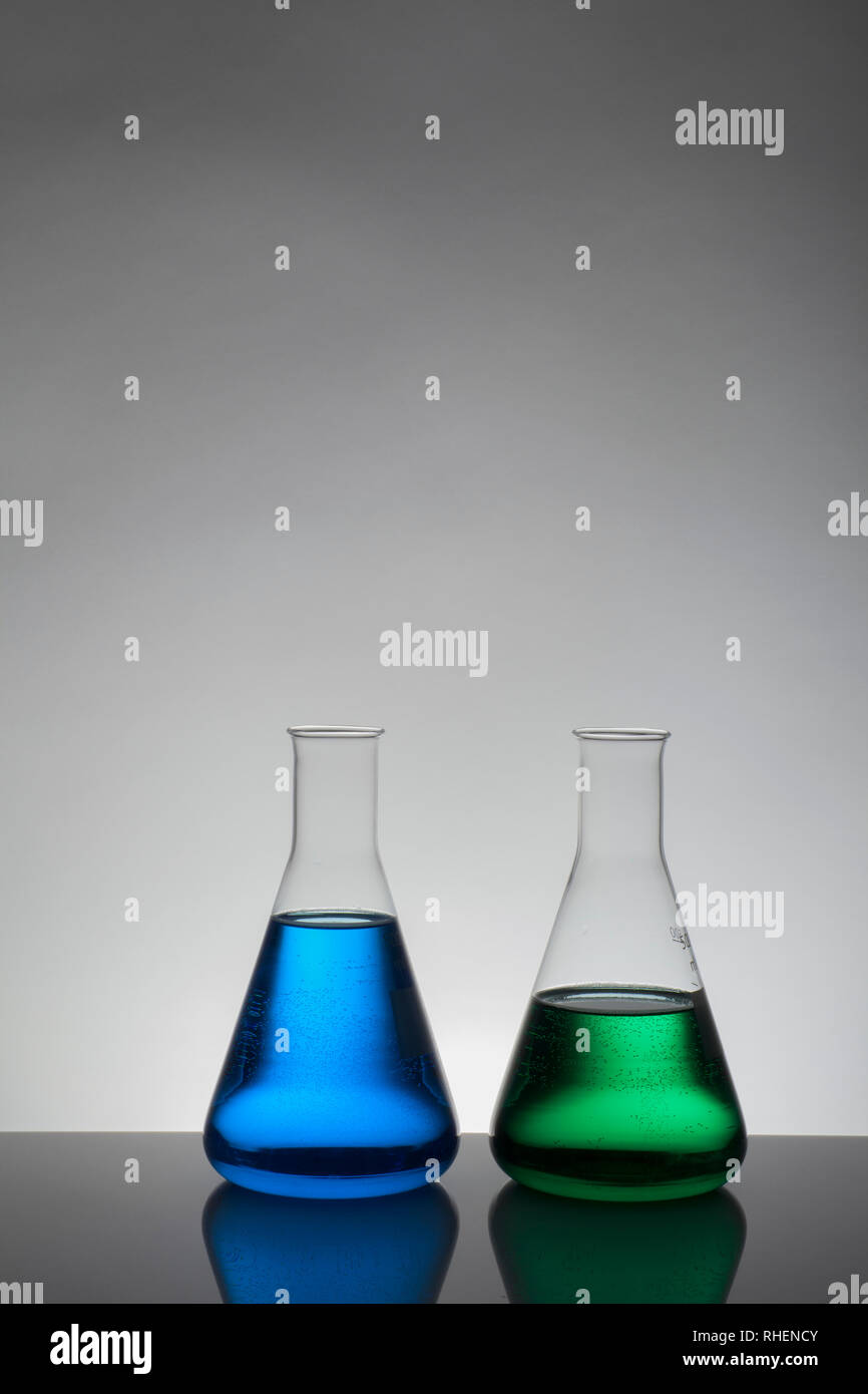 Liquid in laboratory bottles. Scientific biochemical laboratory ...