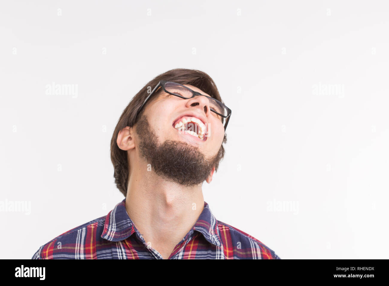 Expression and gesture concept - Handsome man with glasses laughing ...