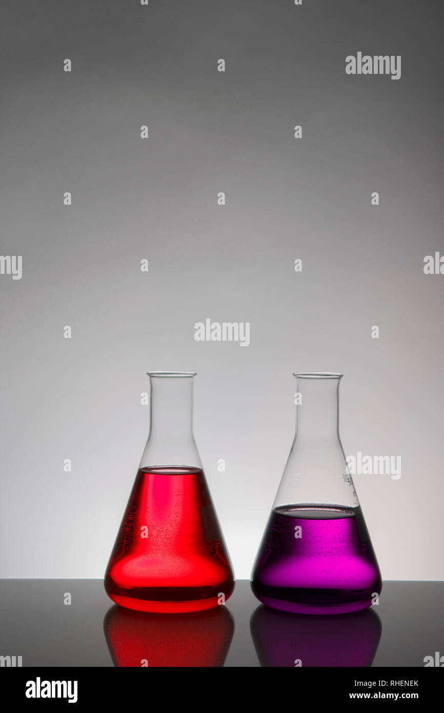 Liquid in laboratory bottles. Scientific biochemical laboratory ...