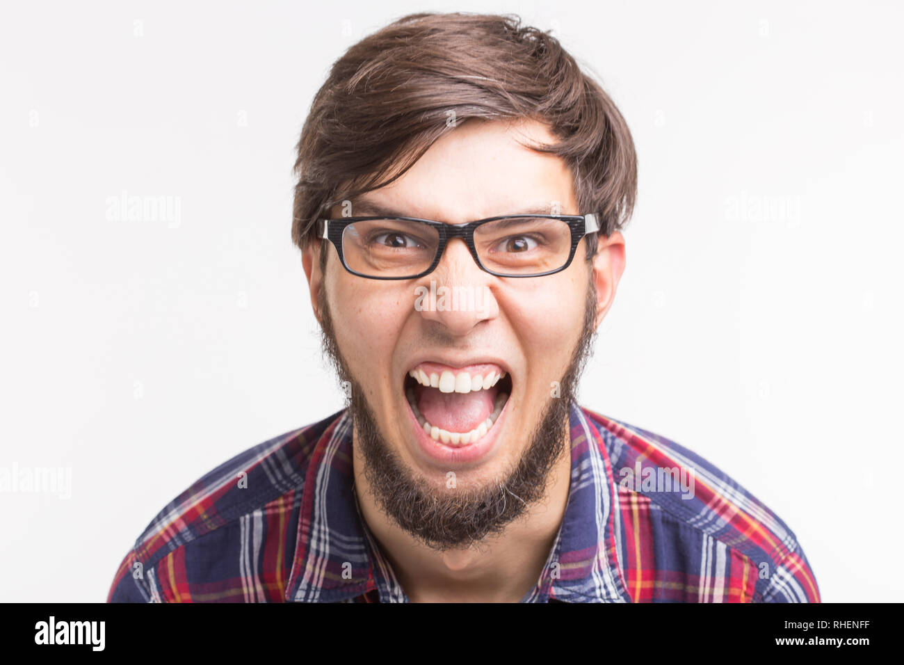 Expression and gesture concept - Portrait of angry man screaming on ...