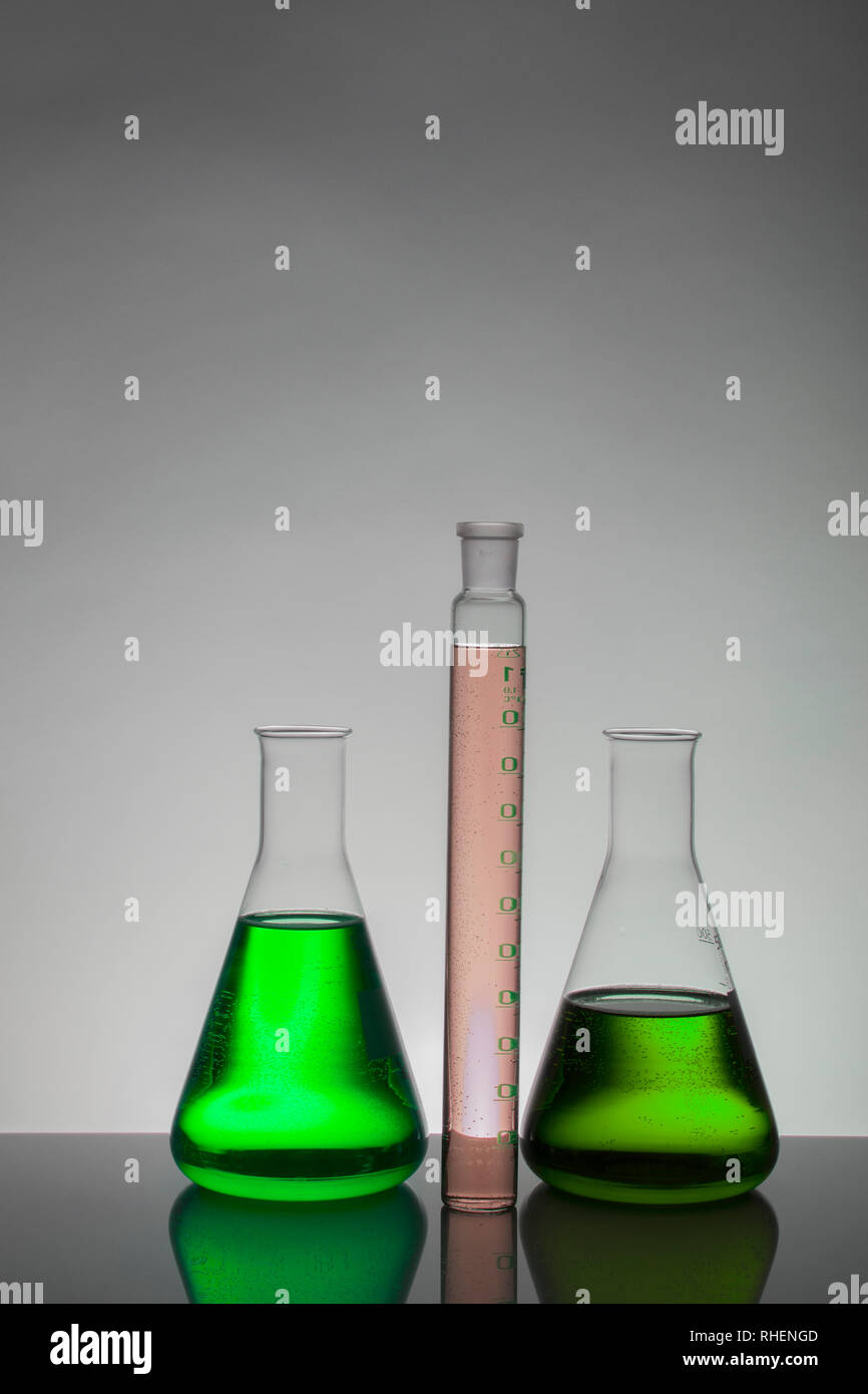 Liquid in laboratory bottles. Scientific biochemical laboratory ...