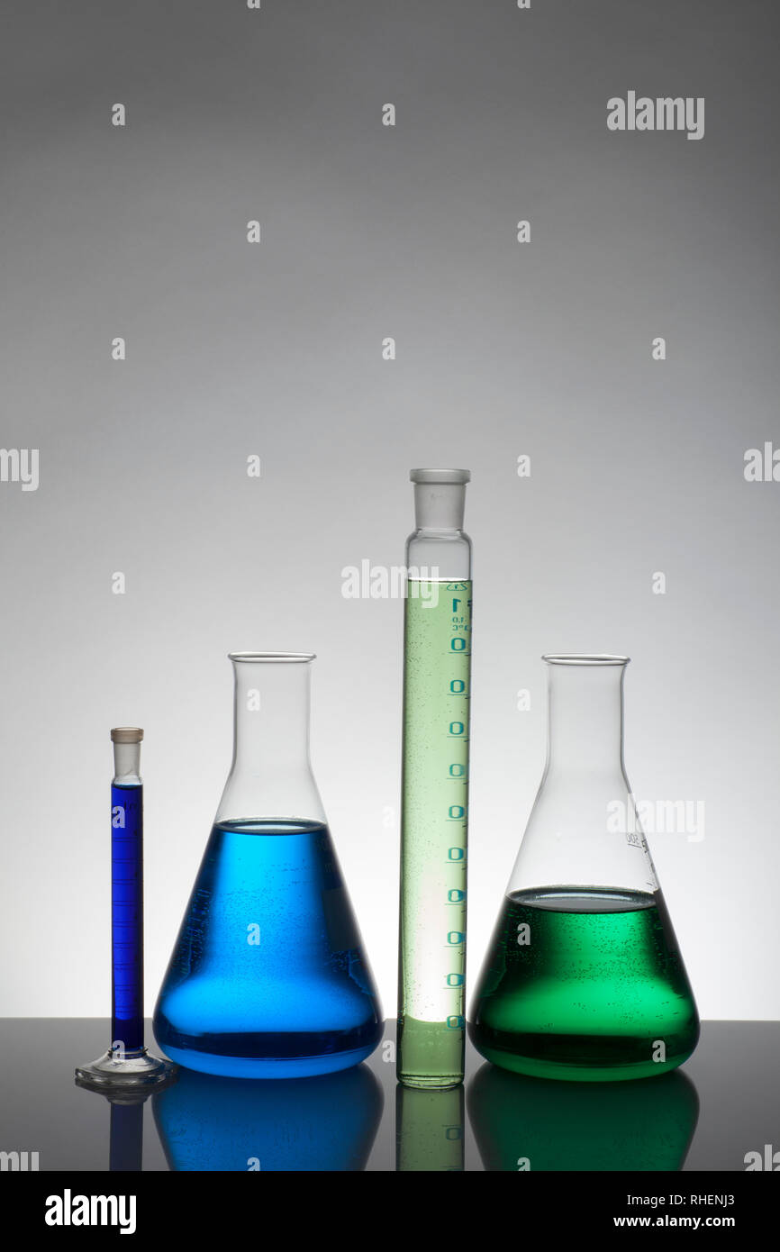 Liquid in laboratory bottles. Scientific biochemical laboratory ...