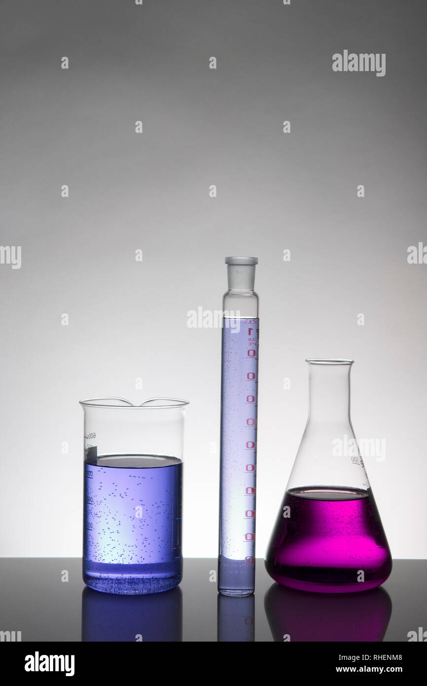 Liquid in laboratory bottles. Scientific biochemical laboratory ...