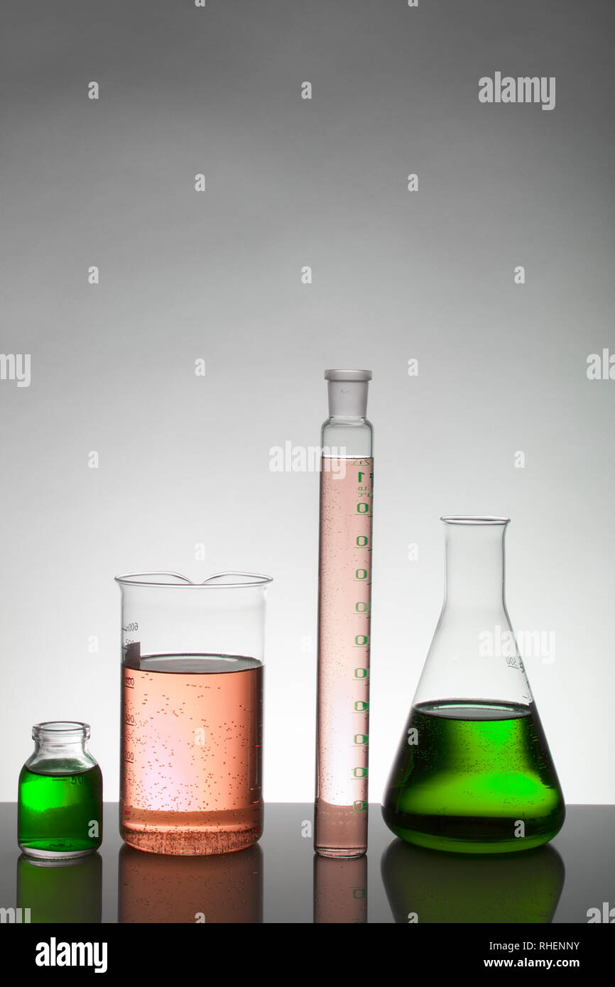 Liquid in laboratory bottles. Scientific biochemical laboratory ...