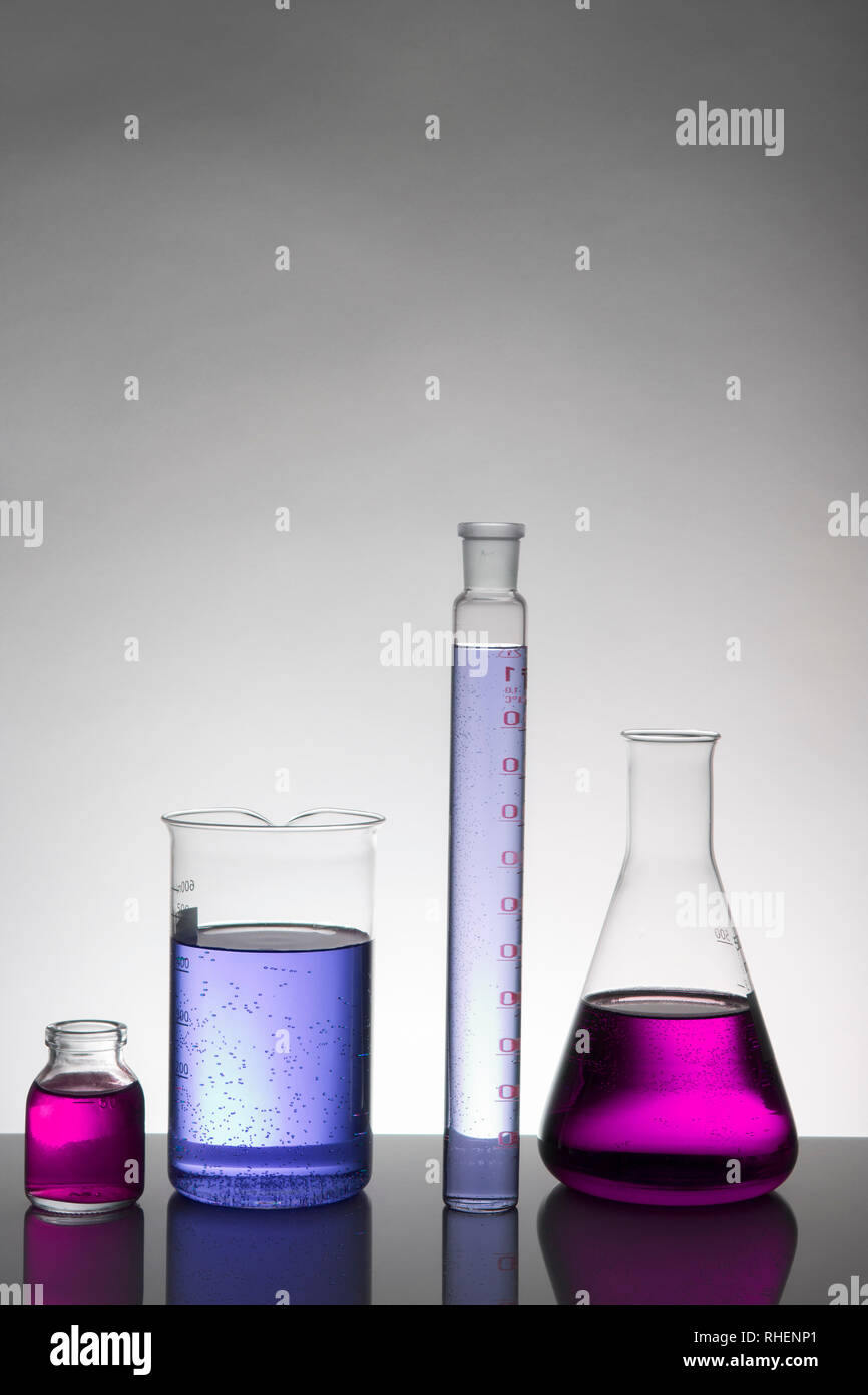 Liquid in laboratory bottles. Scientific biochemical laboratory ...