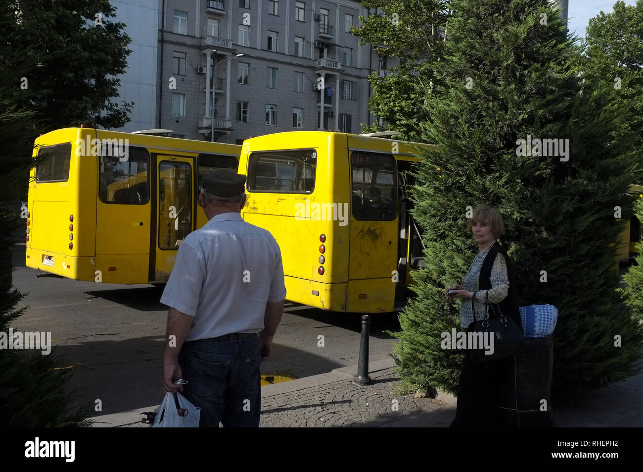 Yellow buses in Tbilisi, Georgia Stock Photo - Alamy