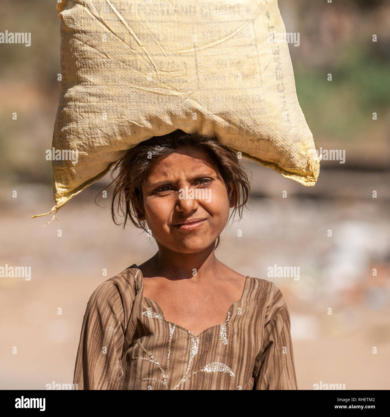 Child carrying heavy load hi-res stock photography and images - Alamy